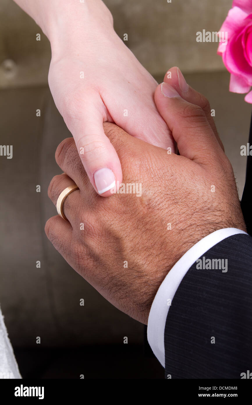 Hands in marriage Stock Photo - Alamy