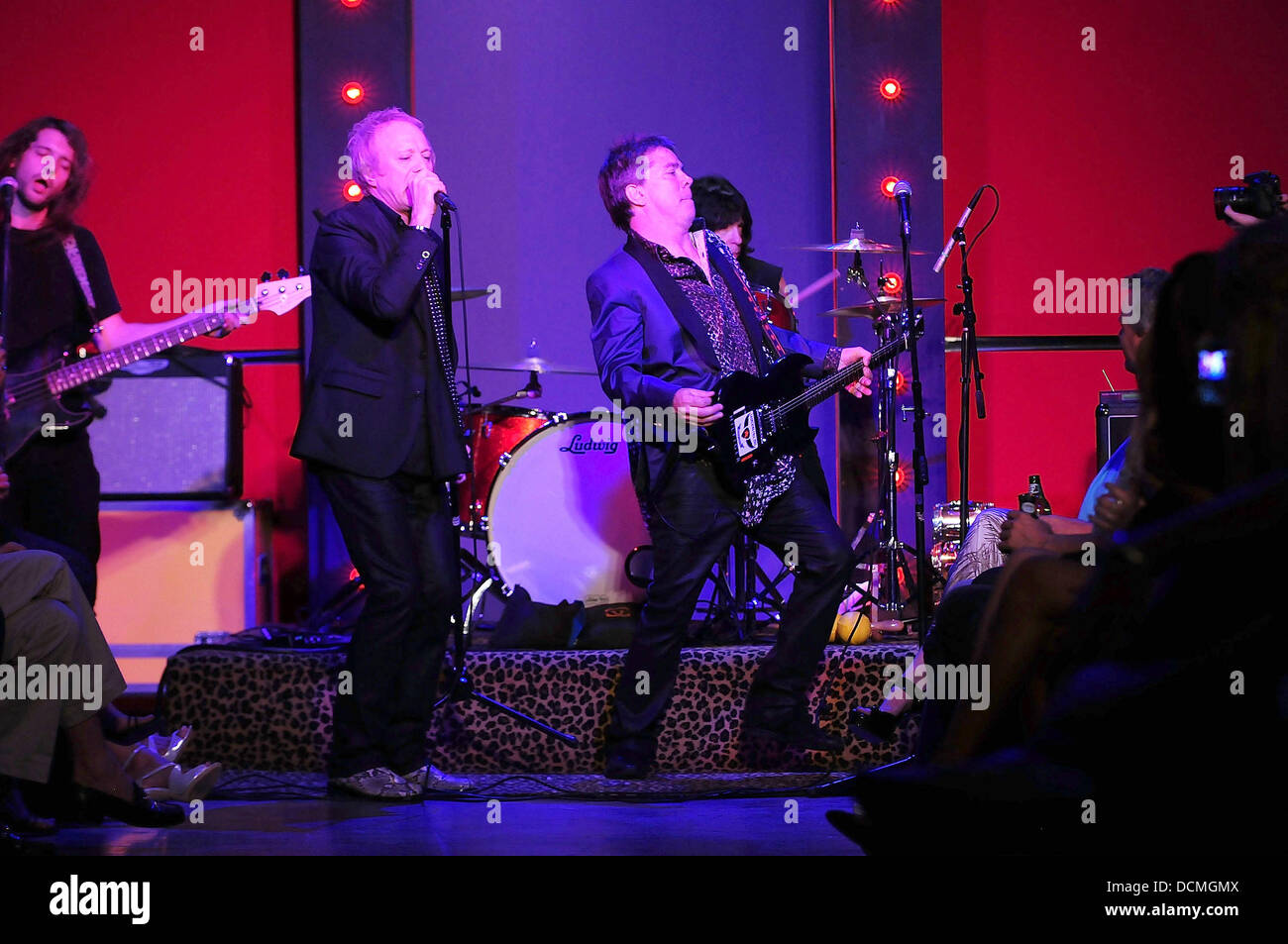 Jimmy Kunes, drummer Marky Ramone and Andy Hilfiger performs after his ...