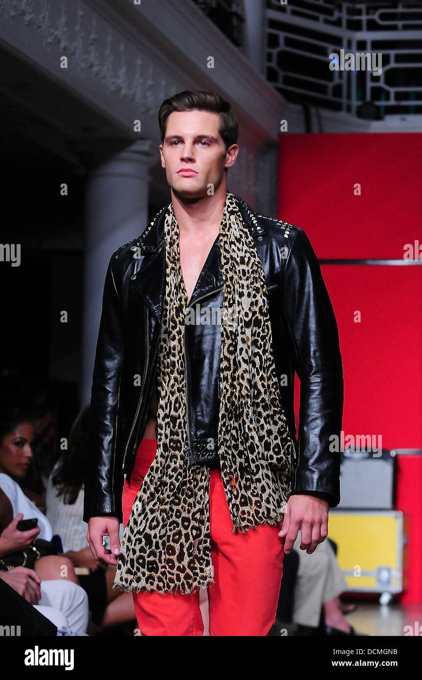 A model walking the runway during Andy Hilfiger's introduction of a ...