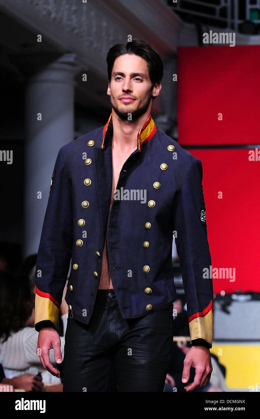A model walking the runway during Andy Hilfiger's introduction of a ...
