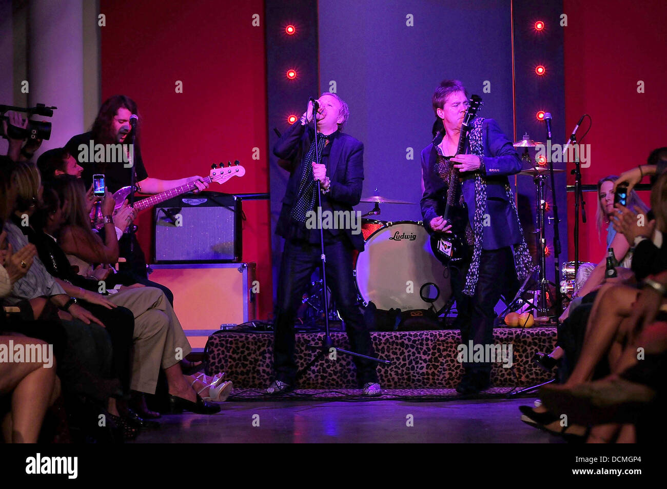 Jimmy Kunes, drummer Marky Ramone and Andy Hilfiger performs after his ...