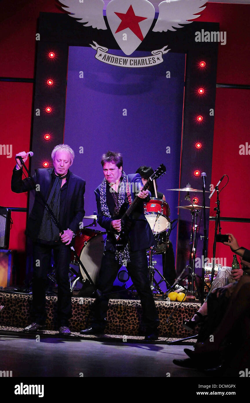 Jimmy Kunes, Andy Hilfiger and drummer Marky Ramone perform after Andy ...