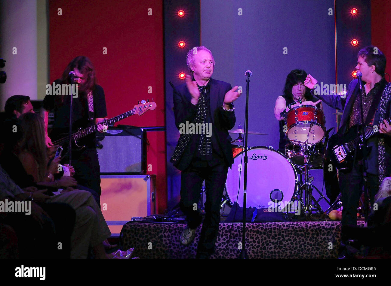 Jimmy Kunes, drummer Marky Ramone and Andy Hilfiger performs after his ...