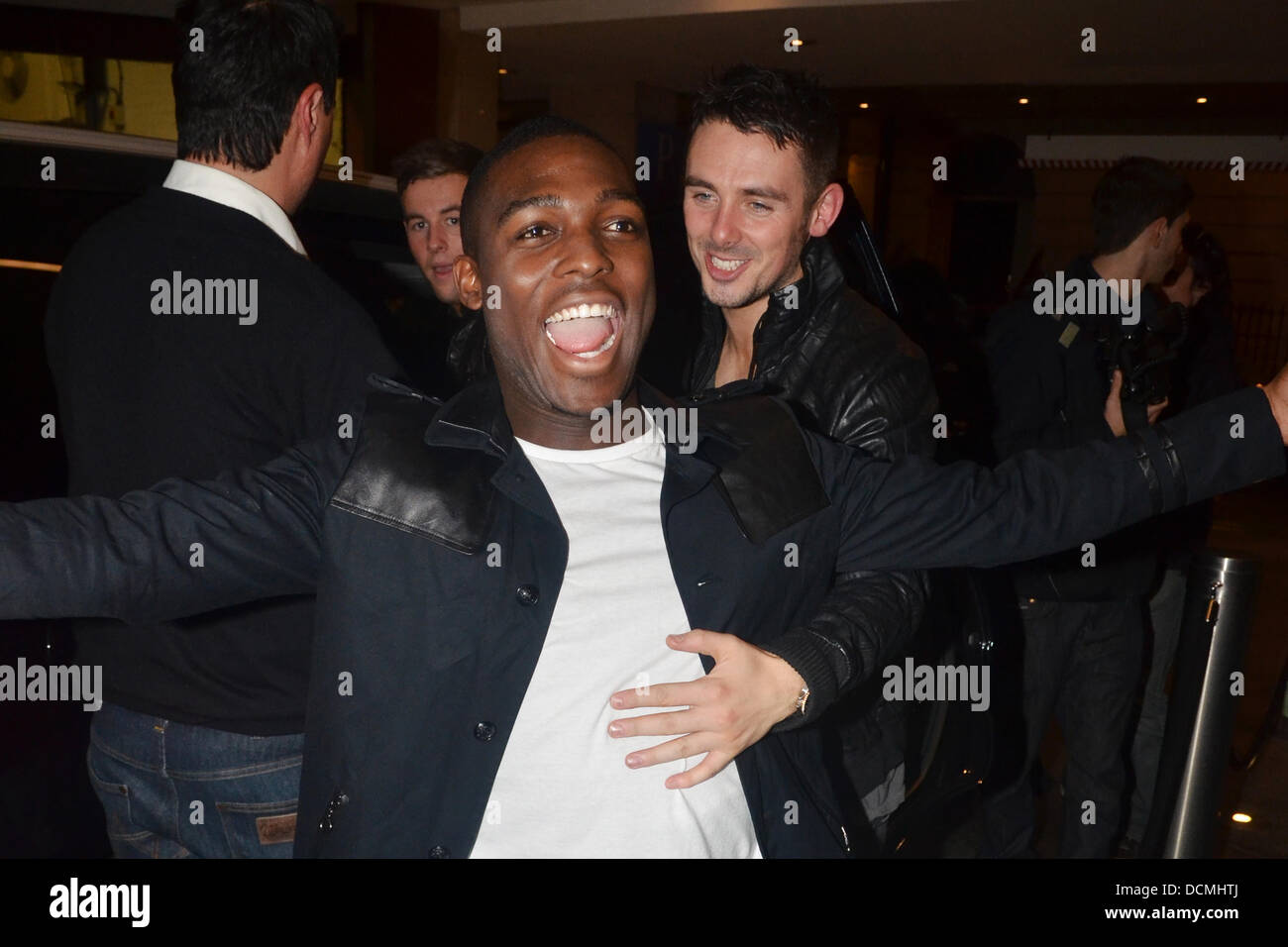 Charlie Healy and Derry Mensah of The Risk X Factor finalists enjoy a ...