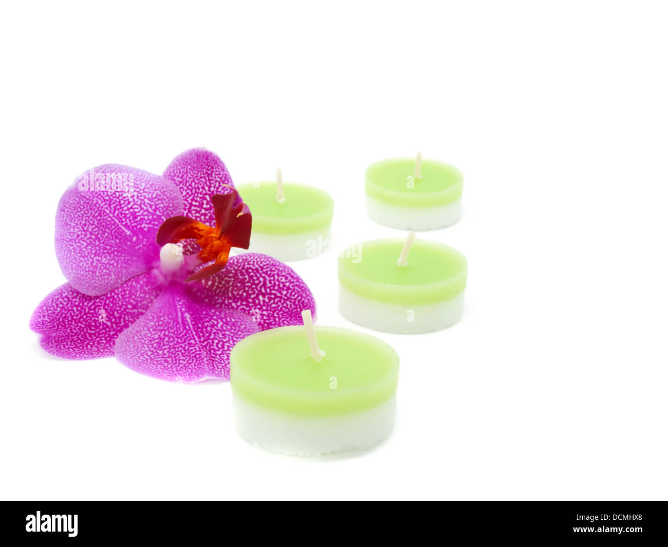 Orchid and candles Cut Out Stock Images & Pictures - Alamy