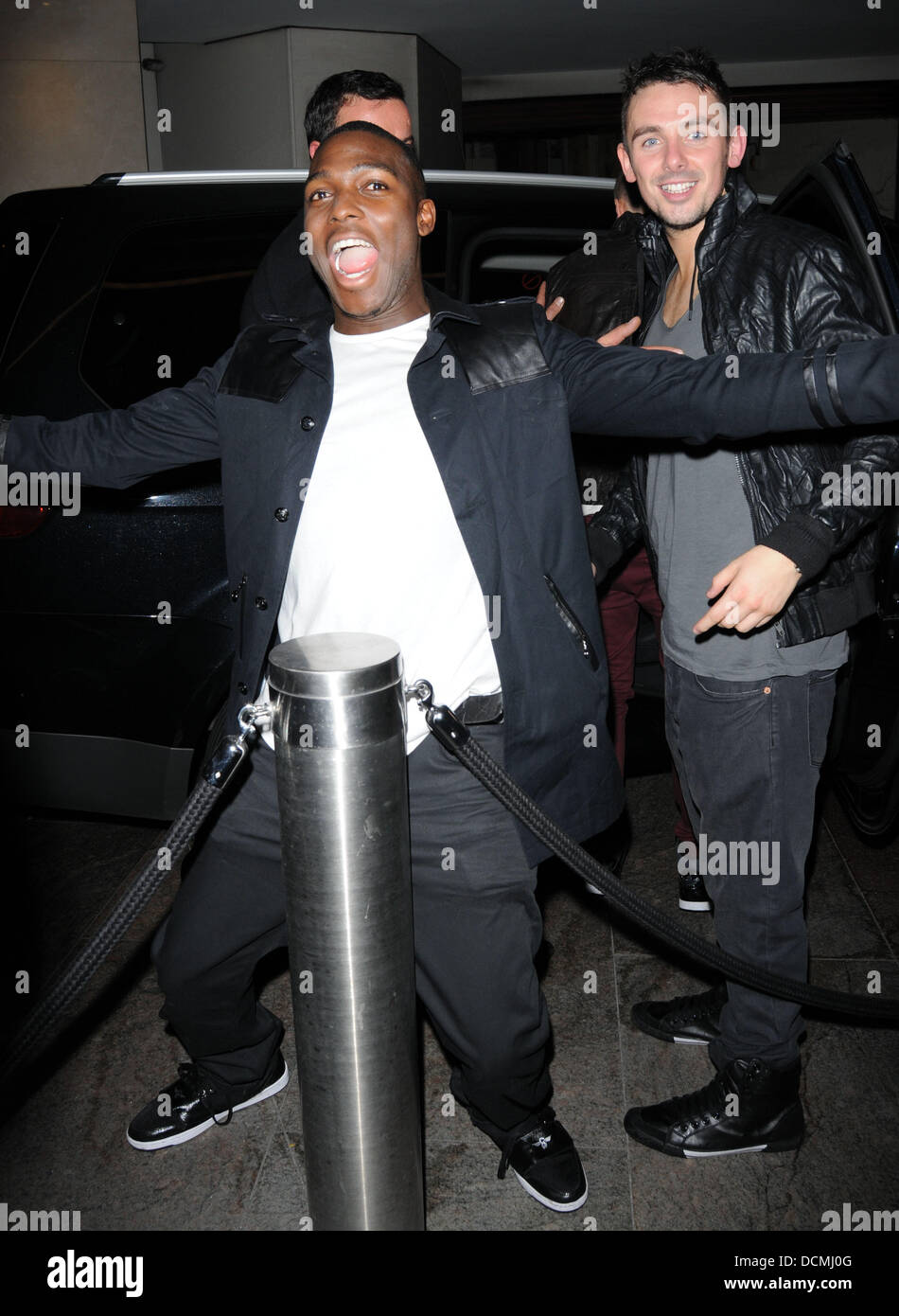 Charlie Healy and Derry Mensah of The Risk X Factor finalists enjoy a ...