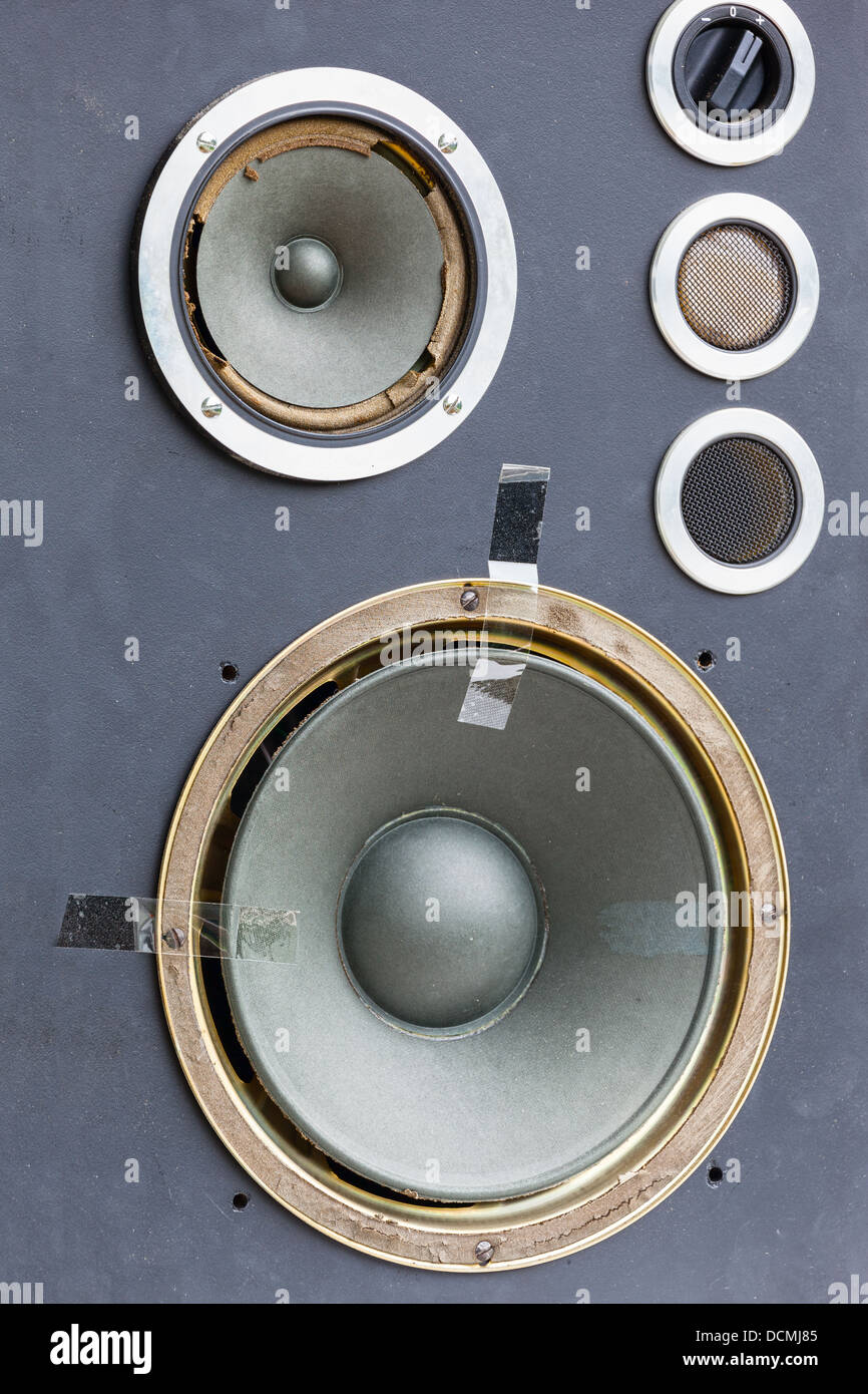 An old and worn speaker to listen to music Stock Photo - Alamy