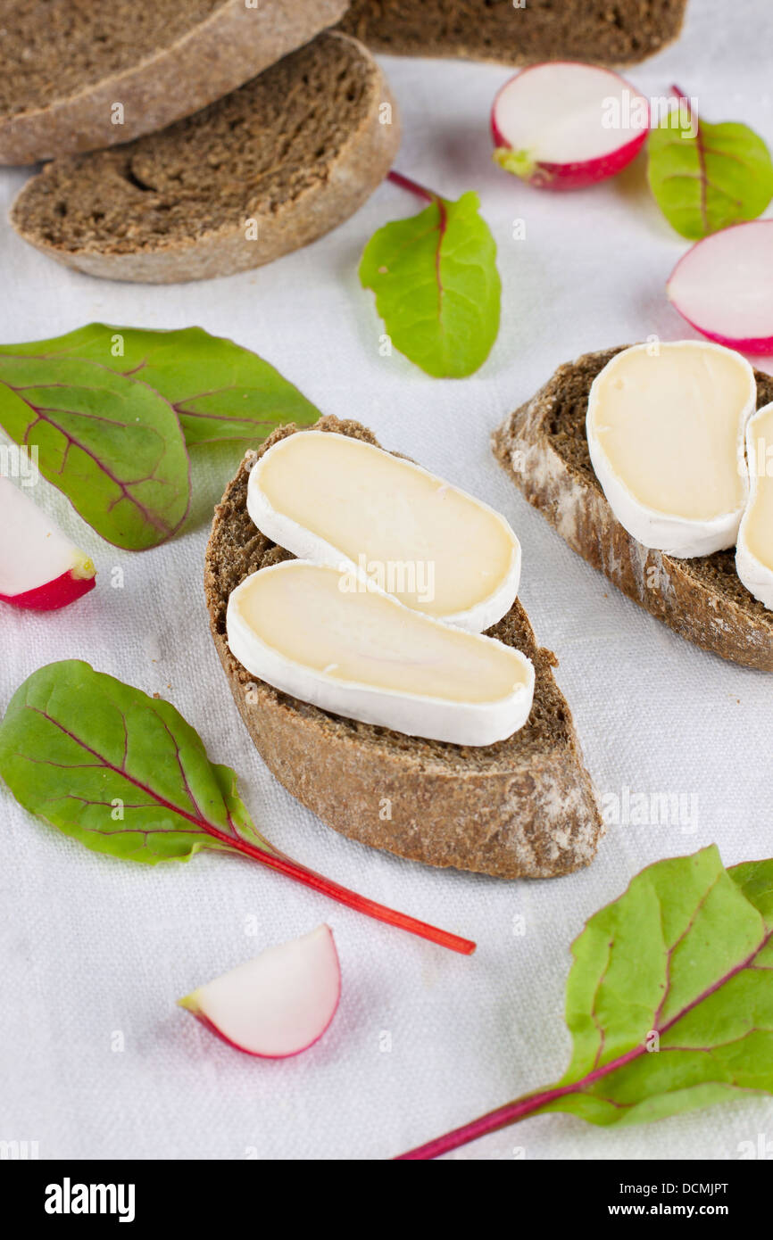 Slices of rye bread with soft cheese Stock Photo - Alamy