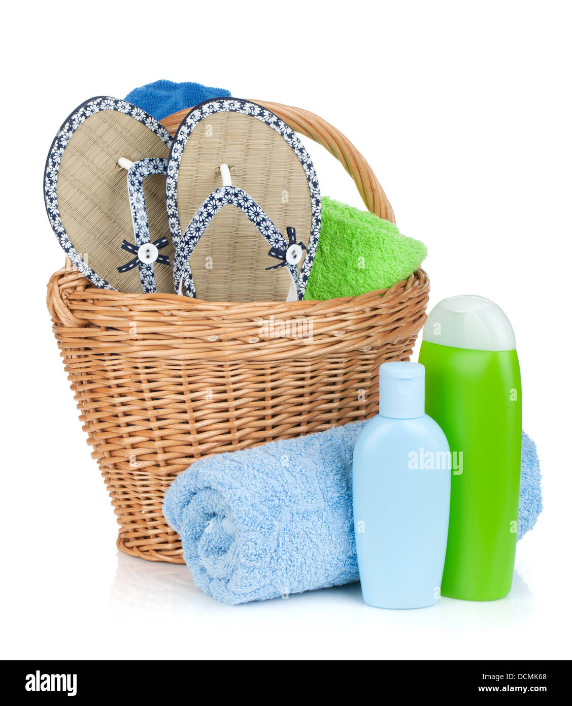 Beach items in basket. Isolated on white background Stock Photo - Alamy