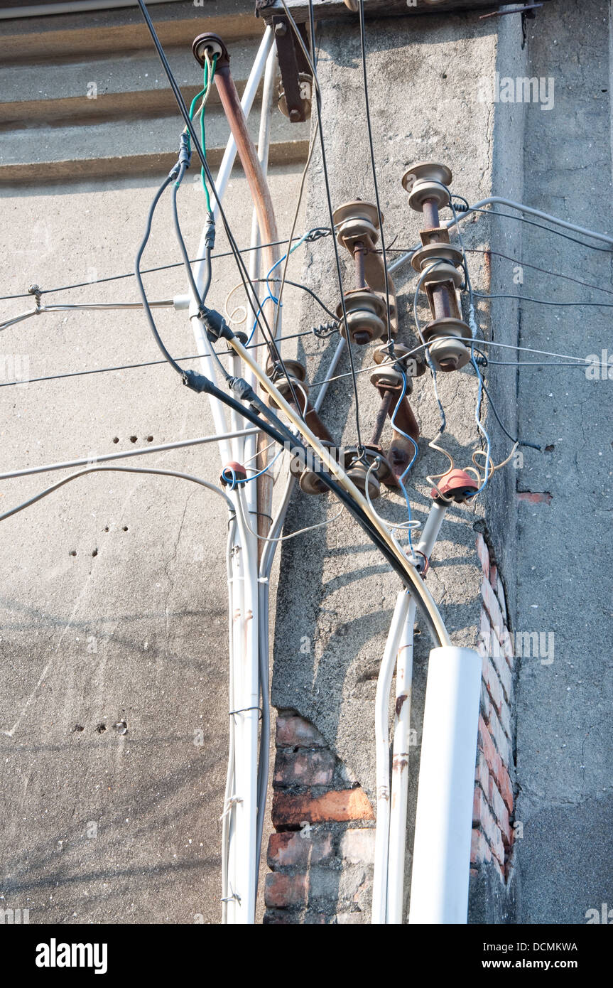 Power line on the wall Stock Photo - Alamy