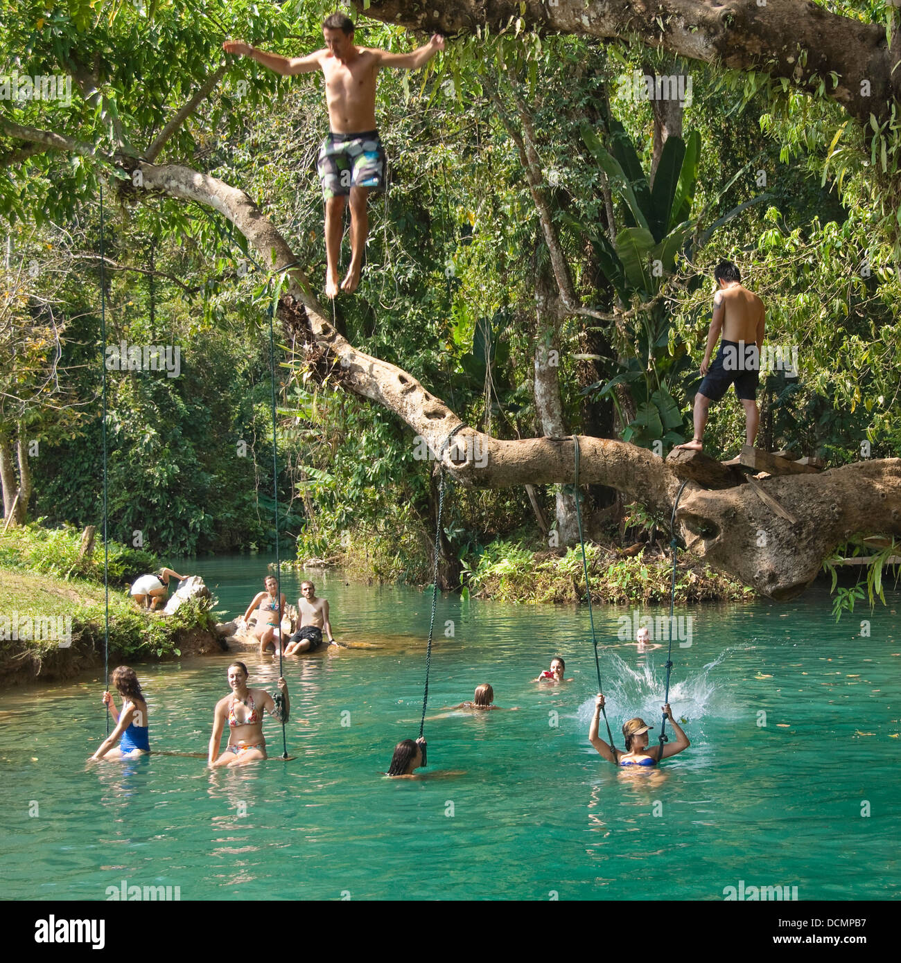 Square view of tourists having fun at Poukham Cave aka Tham Phu Kham ...