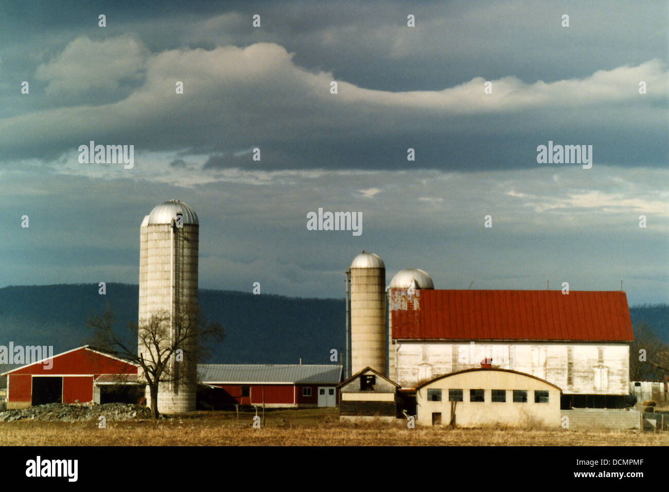 Farm and Dark Clouds Stock Photo - Alamy