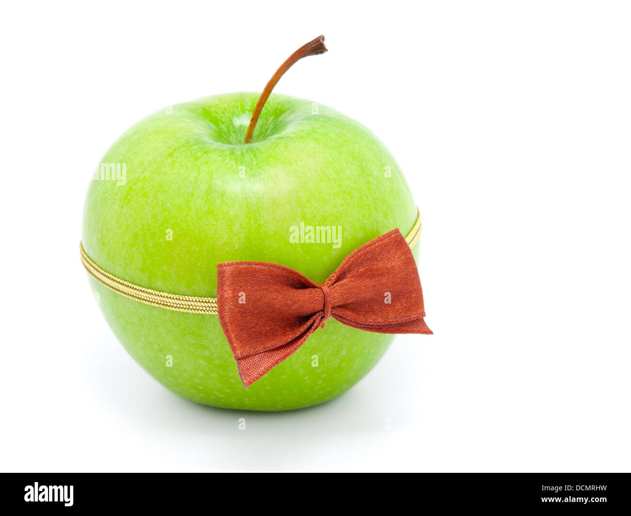 green apple with bow-tie isolated on white background Stock Photo - Alamy