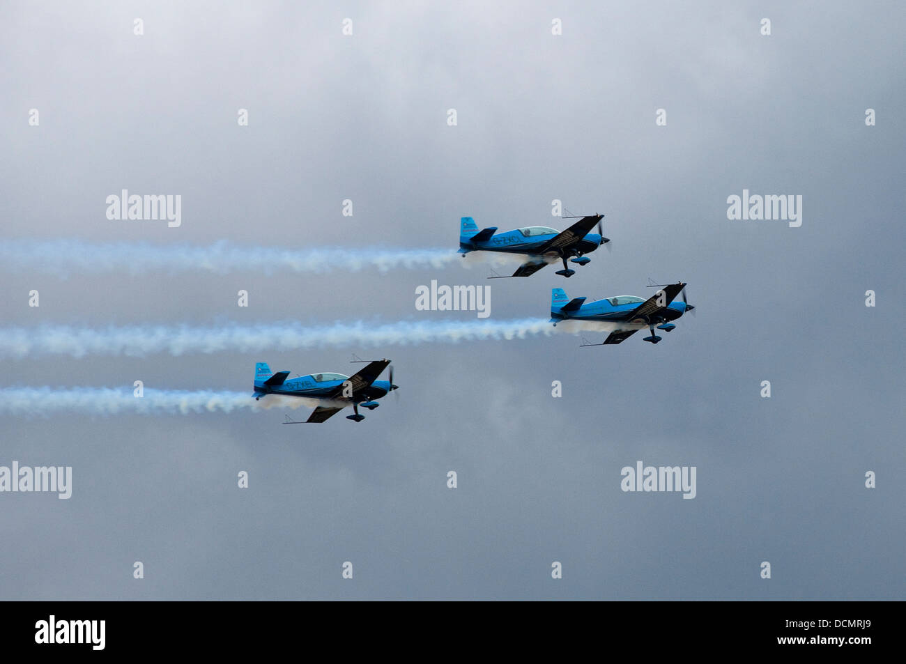 Horizontal view of three aircraft flying passed during an air display ...