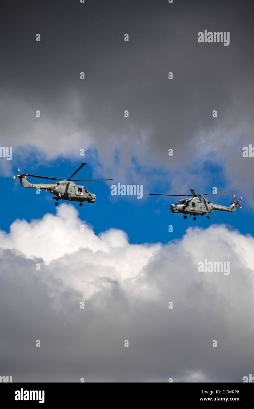 Vertical close up of two Westland Lynx helicopters flying towards each ...