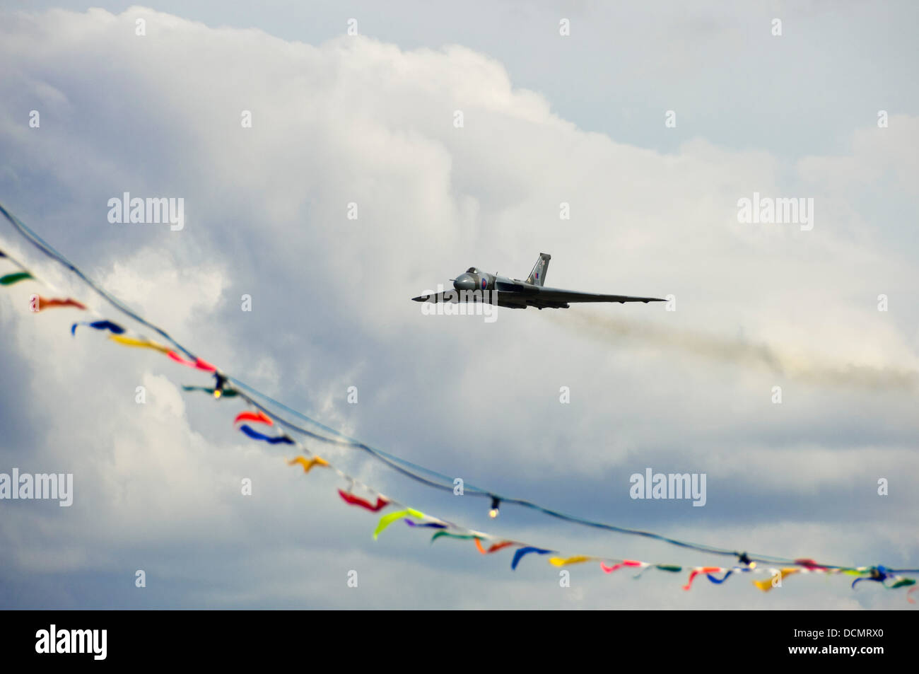 Horizontal close up an RAF Vulcan flying performing a fly passed an air ...