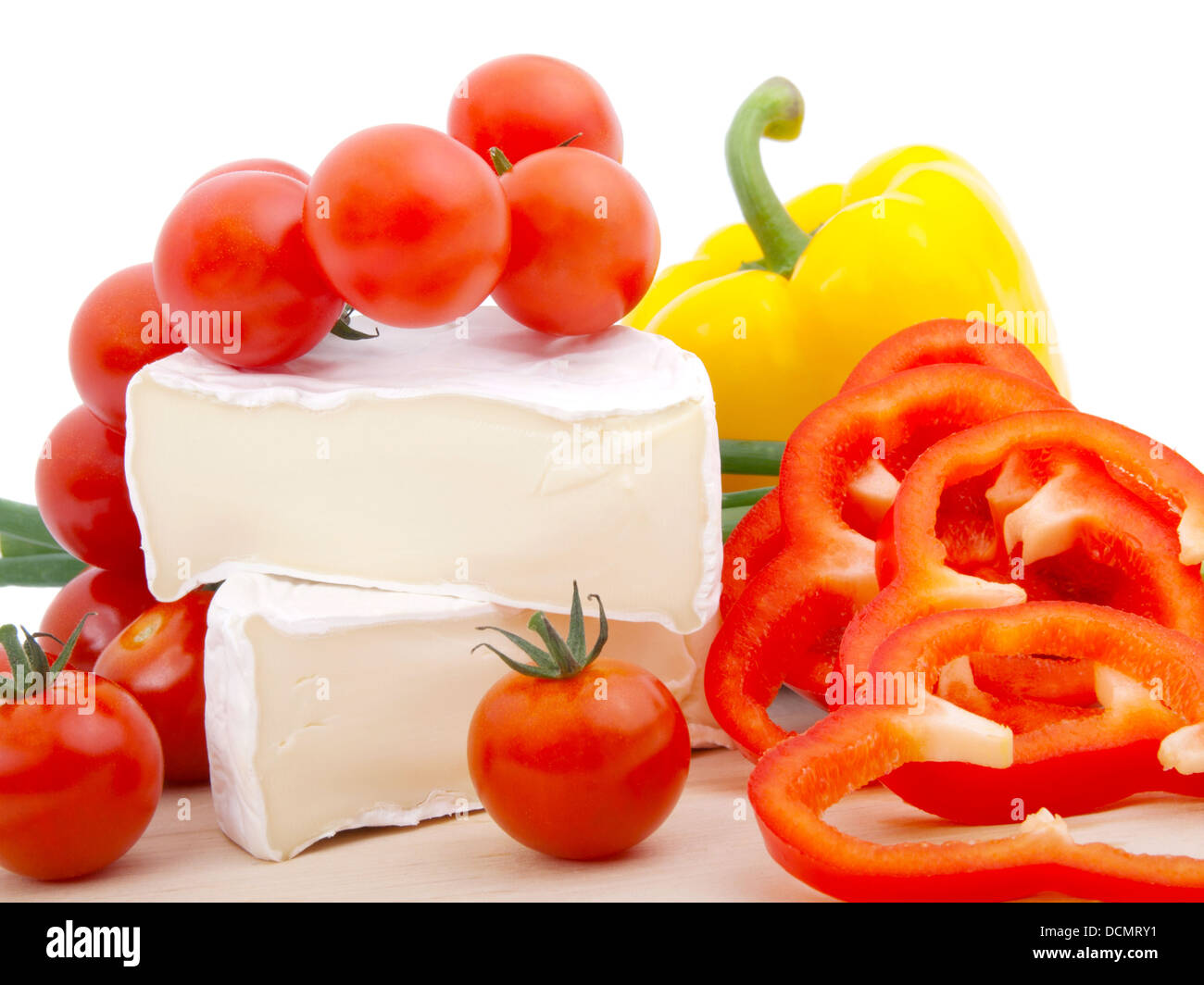 Wheel of French cheese with vegetables, on white background Stock Photo ...