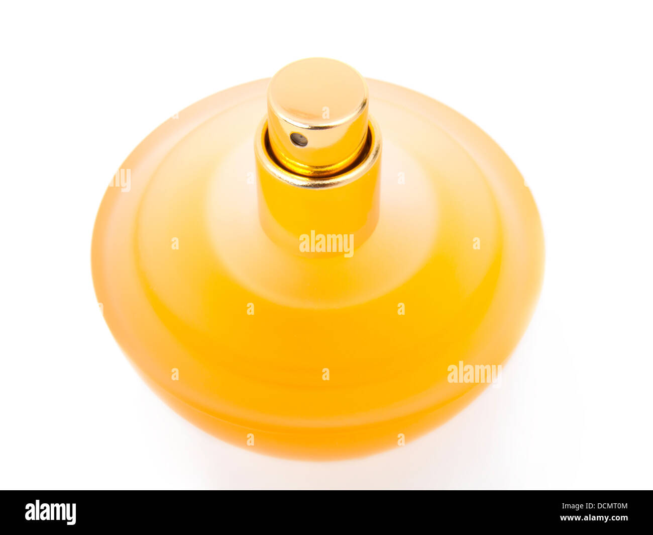Yellow beautiful bottle of perfume Stock Photo - Alamy