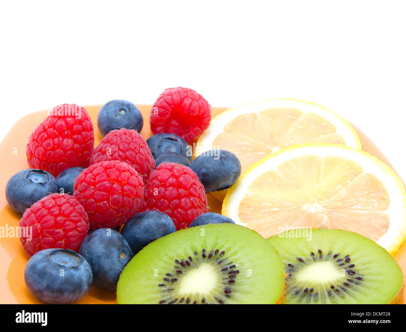 blueberry, raspberries, kiwi and lemon Stock Photo - Alamy