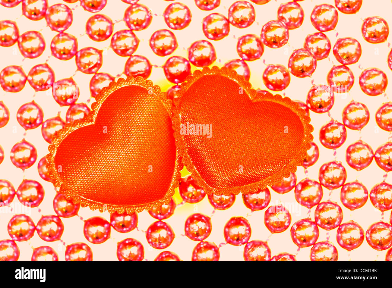 Two Silk red hearts Stock Photo - Alamy