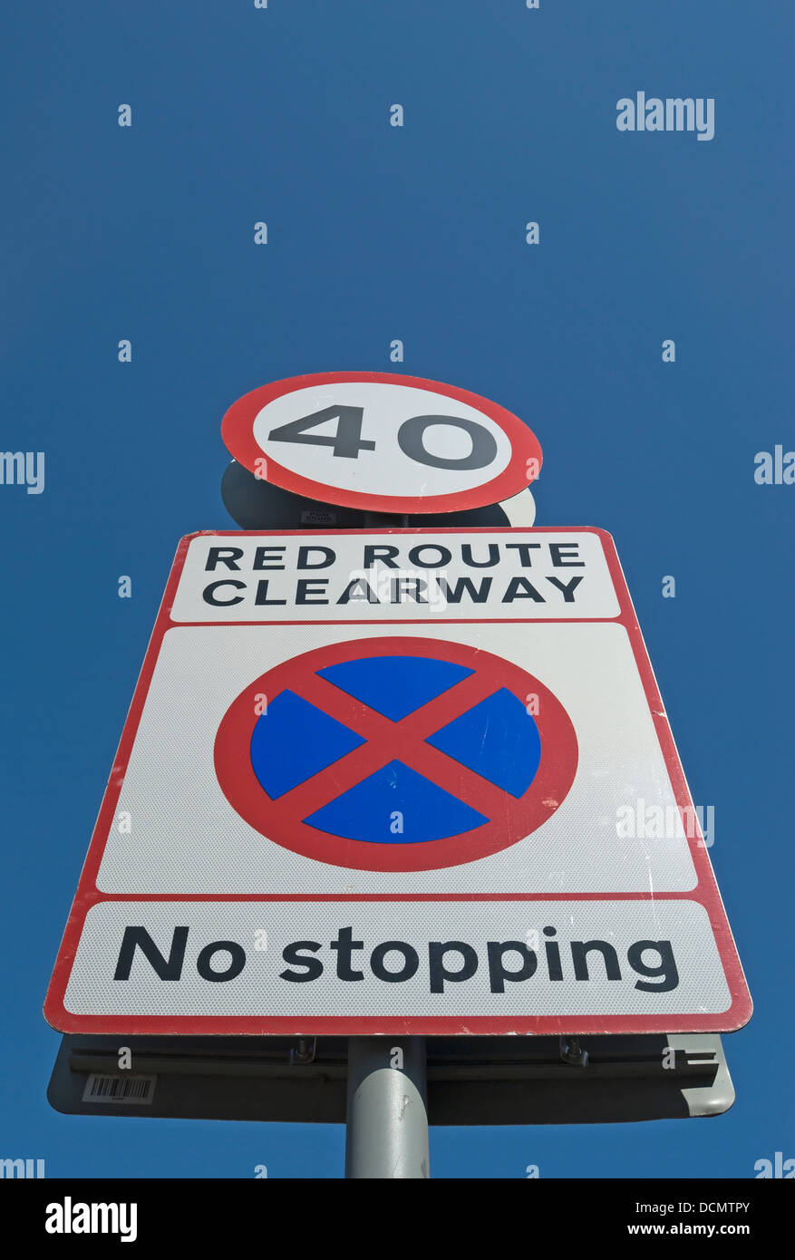 british red route clearway road sign with no stopping image and 40mph ...