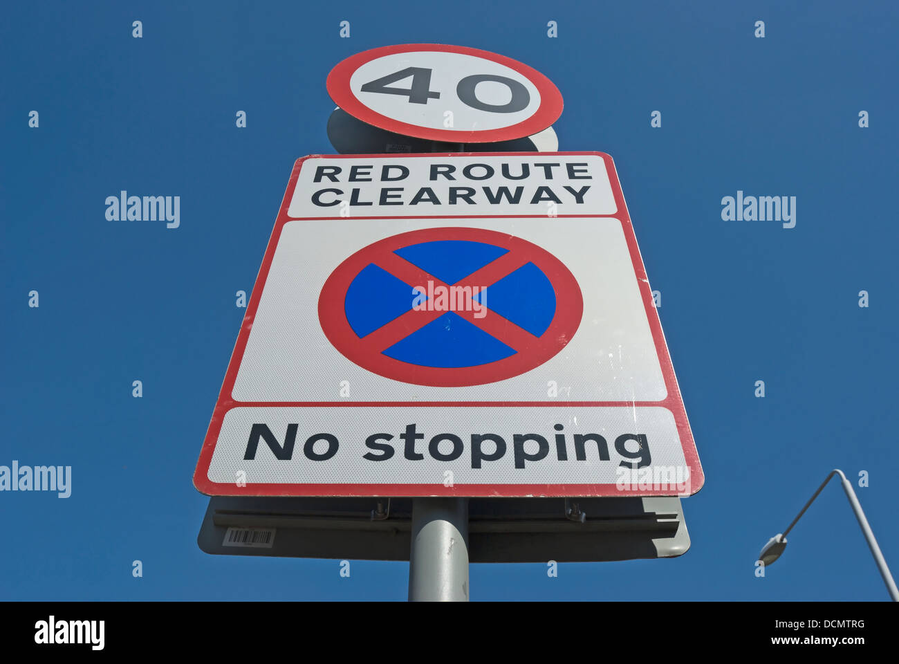 british red route clearway road sign with no stopping image and 40mph ...