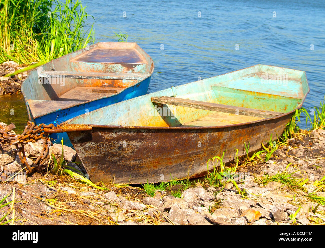 A moored rowing boat in a canal Stock Photo - Alamy