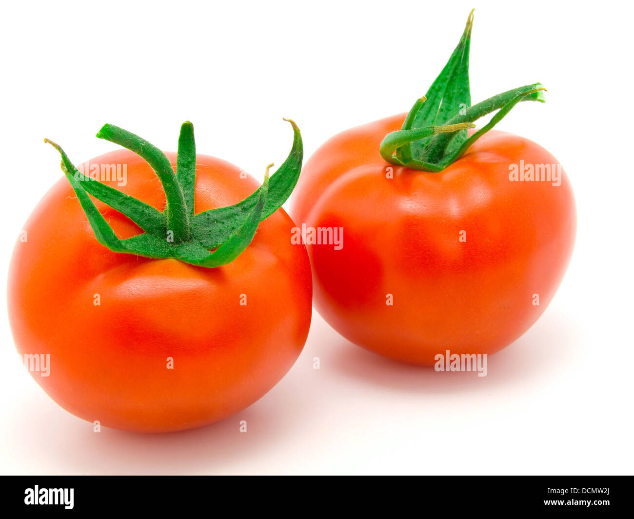 two red tomato isolated on white background Stock Photo - Alamy
