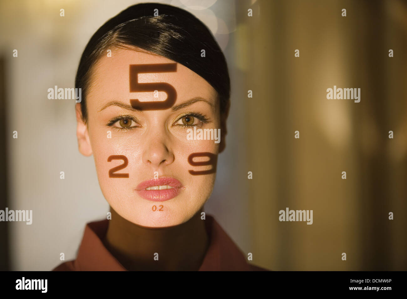 Woman With Optical Exam Numbers On Her Face Stock Photo Alamy