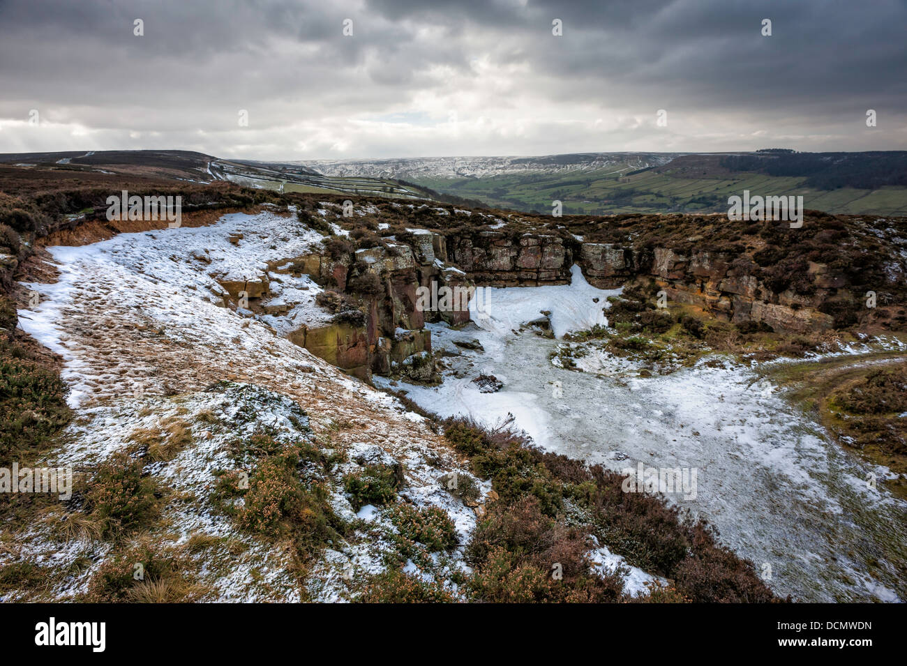 Disused stone quarry in North York Moors in winter near the village of ...