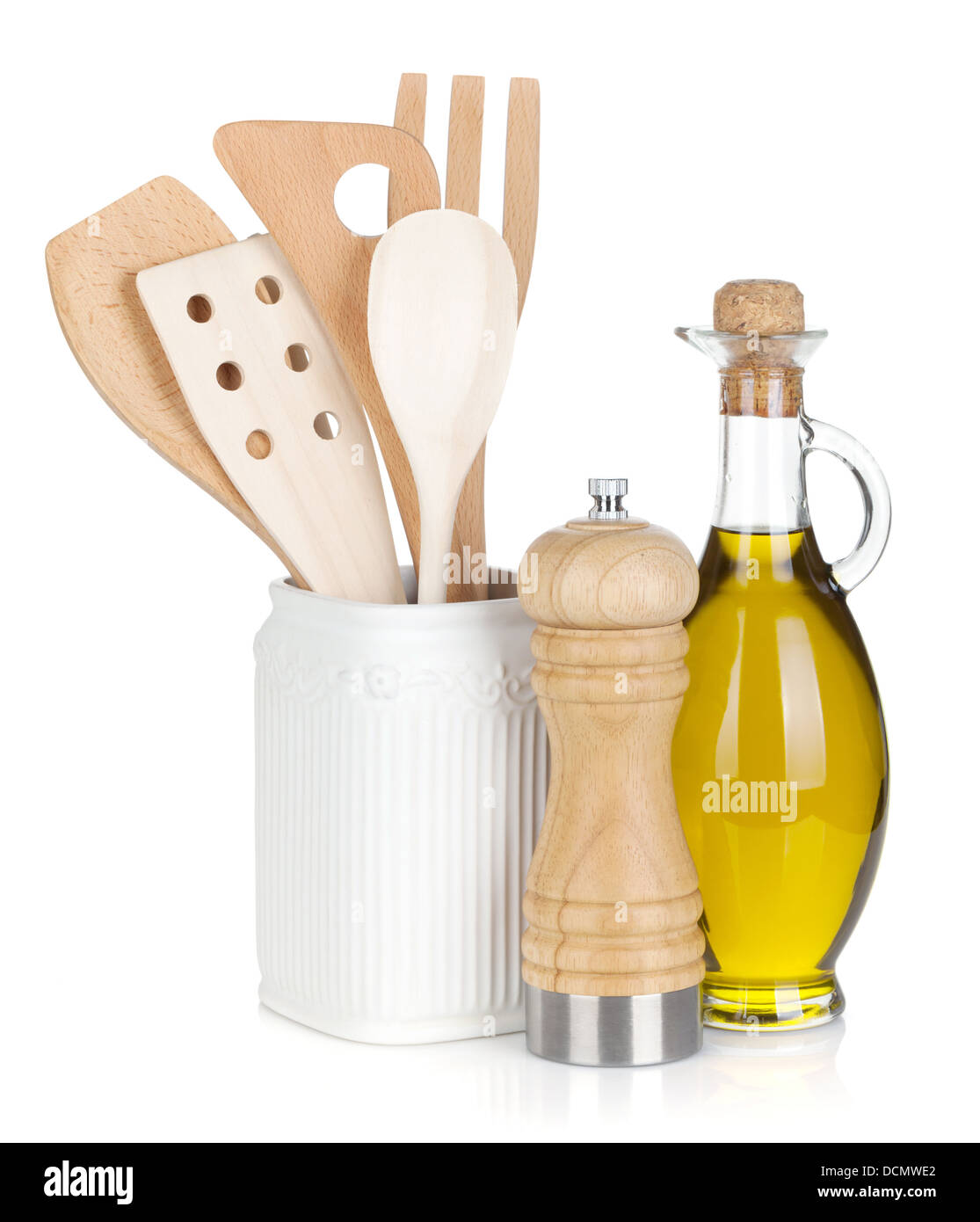 Kitchen utensils in holder and condiments. Isolated on white background ...