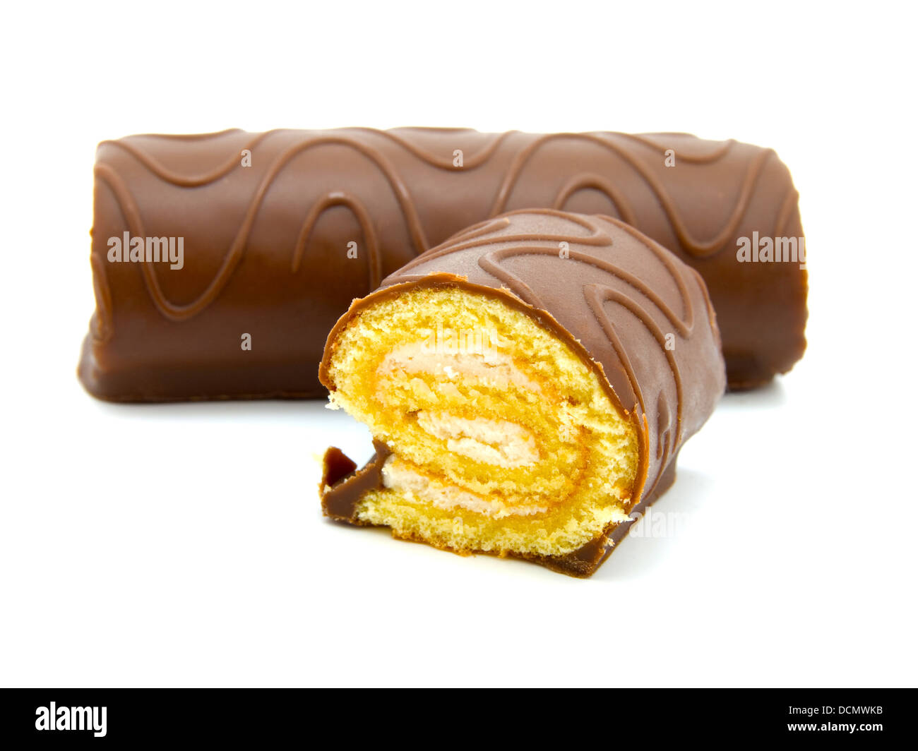 two chocolate roll with cream on a white background Stock Photo - Alamy