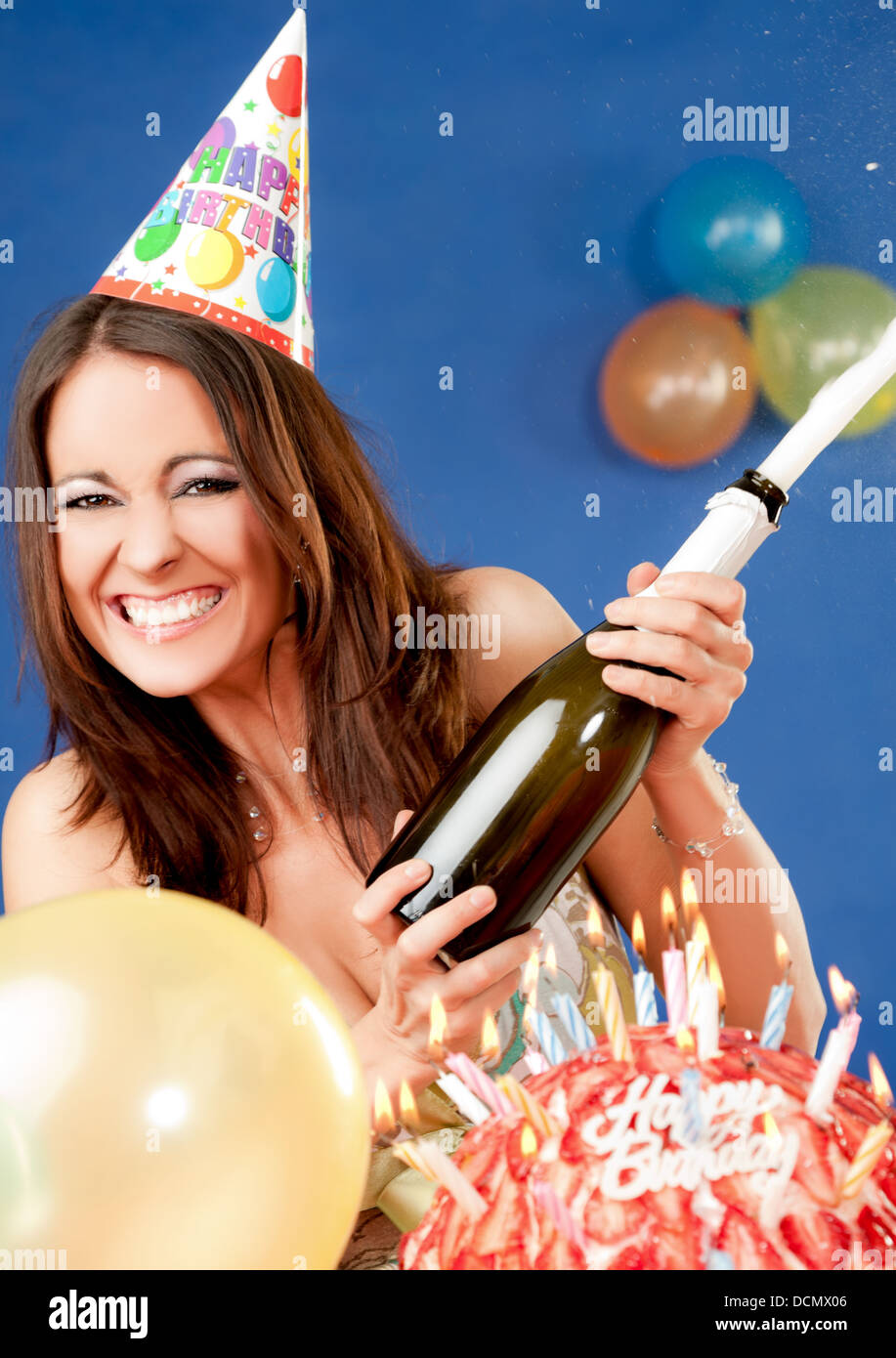 excited female birthday champagne Stock Photo - Alamy