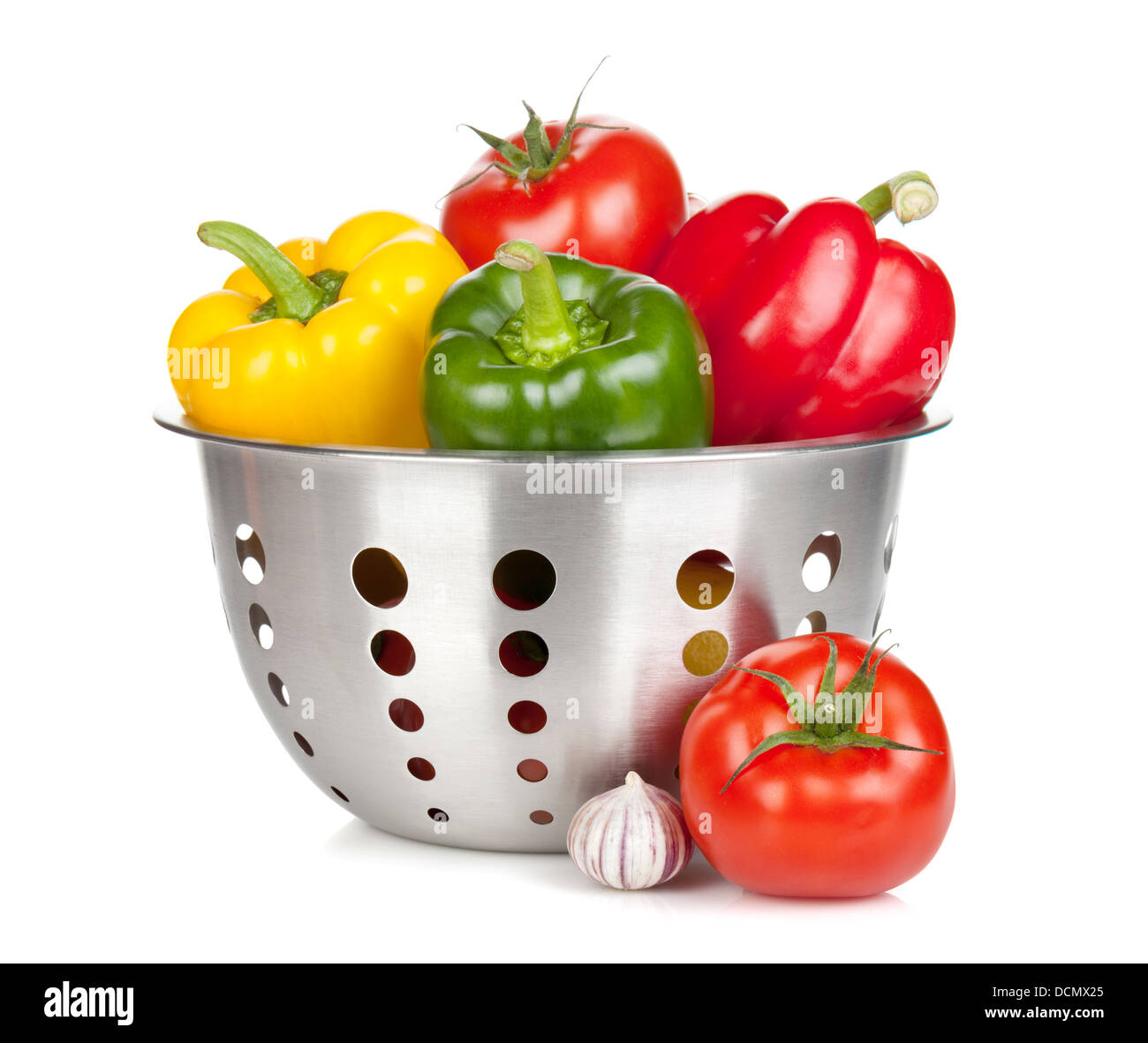 Fresh ripe vegetables in colander. Isolated on white background Stock ...