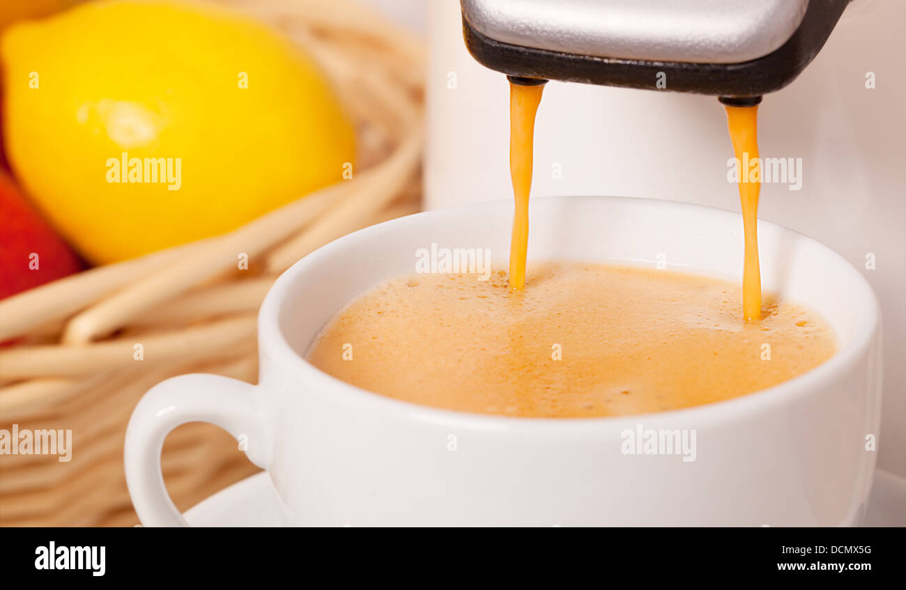 Fresh steaming espresso coffee being made Stock Photo - Alamy