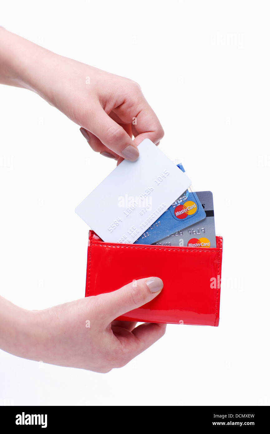 a hand taking credit cards from a wallet Stock Photo - Alamy