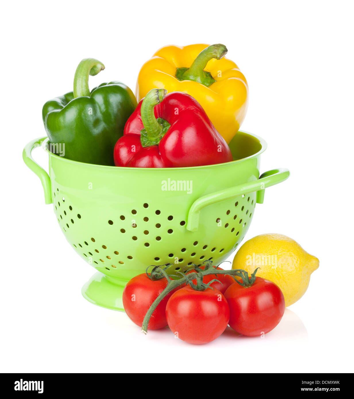 Fresh ripe vegetables in colander. Isolated on white background Stock ...