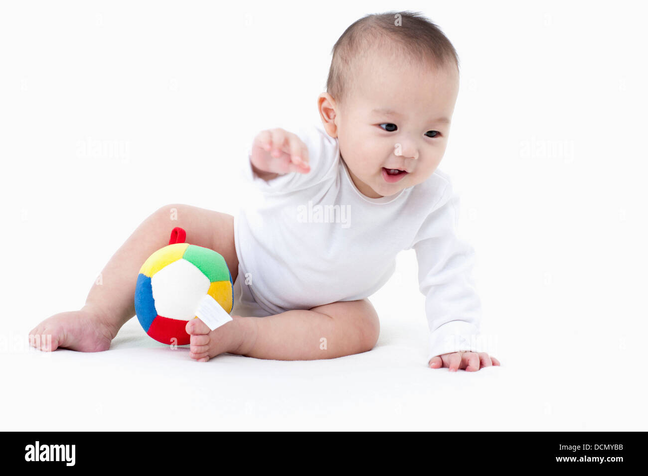 a baby with a toy ball Stock Photo - Alamy