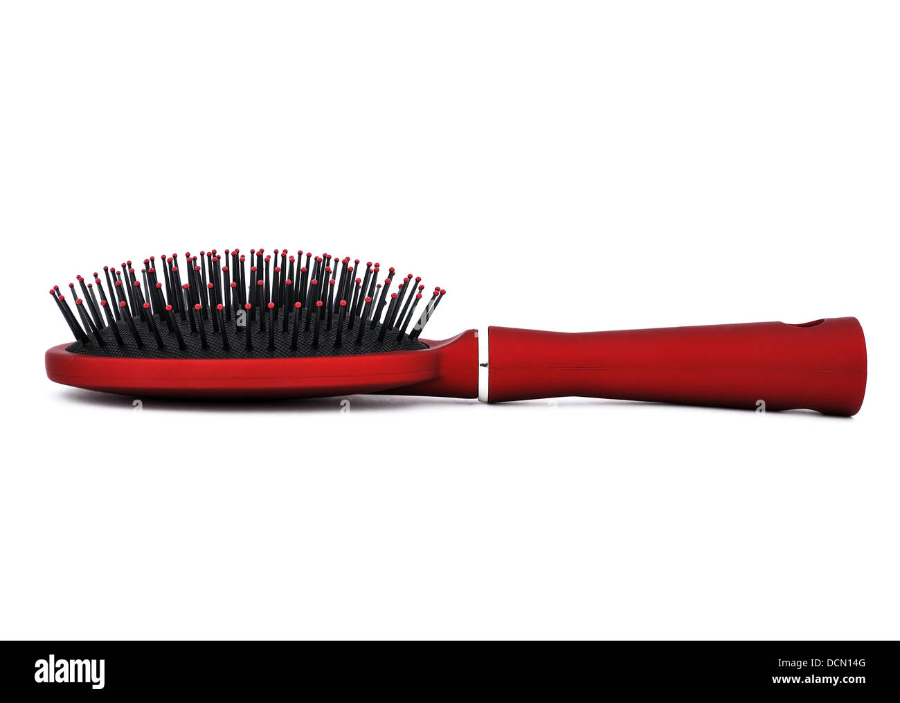 Red hair comb Cut Out Stock Images & Pictures - Alamy