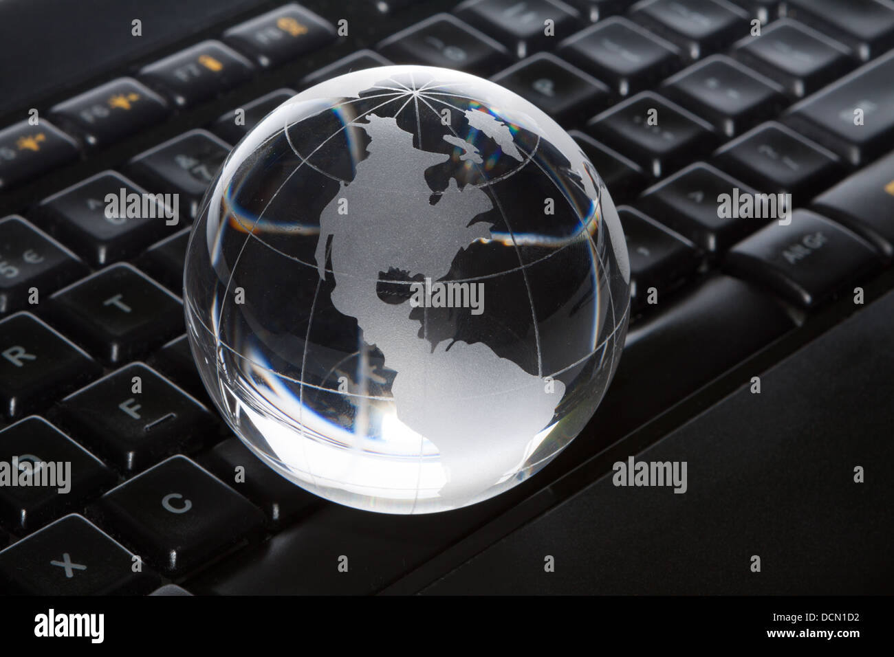 Globe and keyboard Stock Photo - Alamy