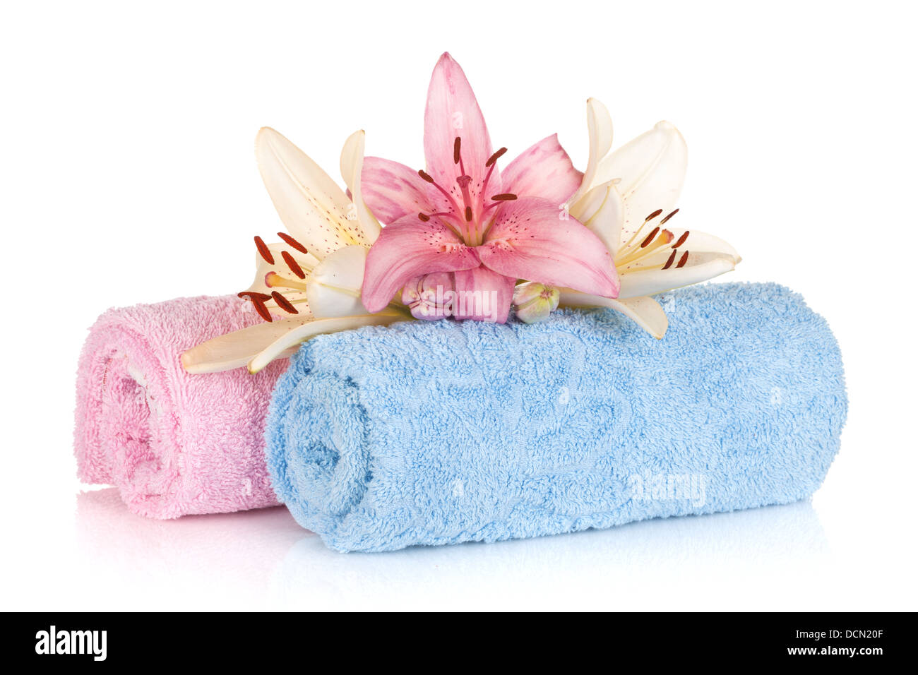 Spa setting with colorful lily flowers. Isolated on white background ...