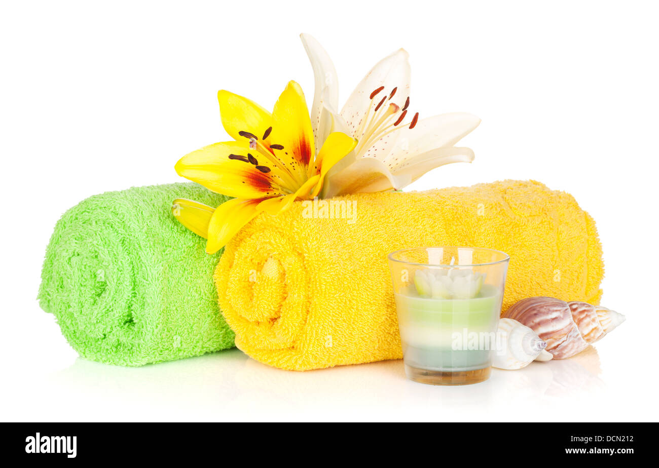 Spa setting with colorful lily flowers. Isolated on white background ...