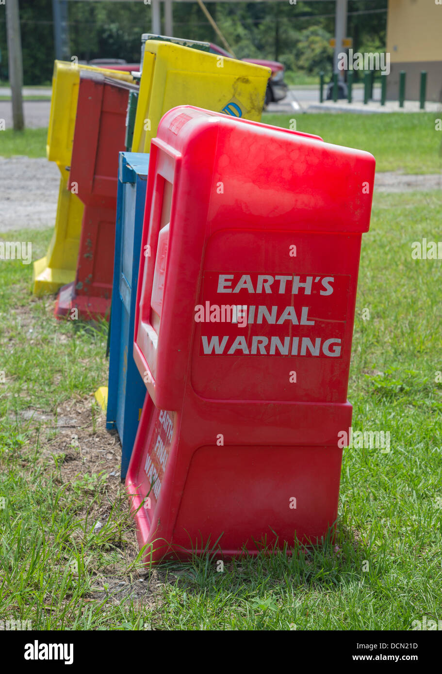 Earth's final warning box in a row of newspaper boxes Stock Photo - Alamy
