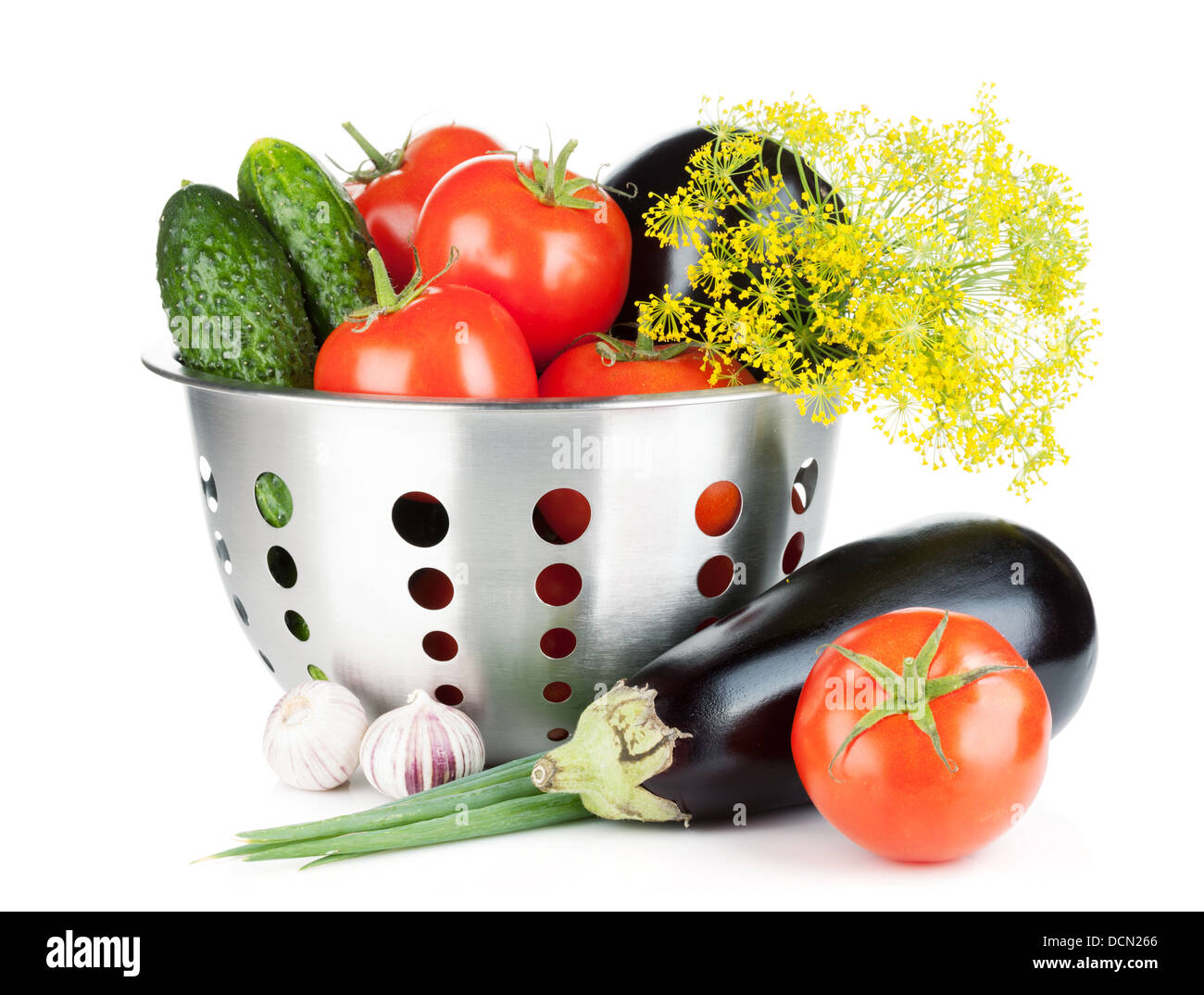 Fresh ripe vegetables in colander. Isolated on white background Stock ...