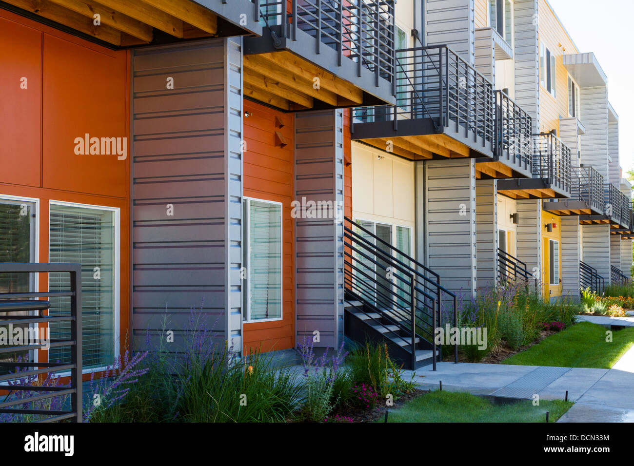 Modern arapartment complex painted in bright colors Stock Photo - Alamy