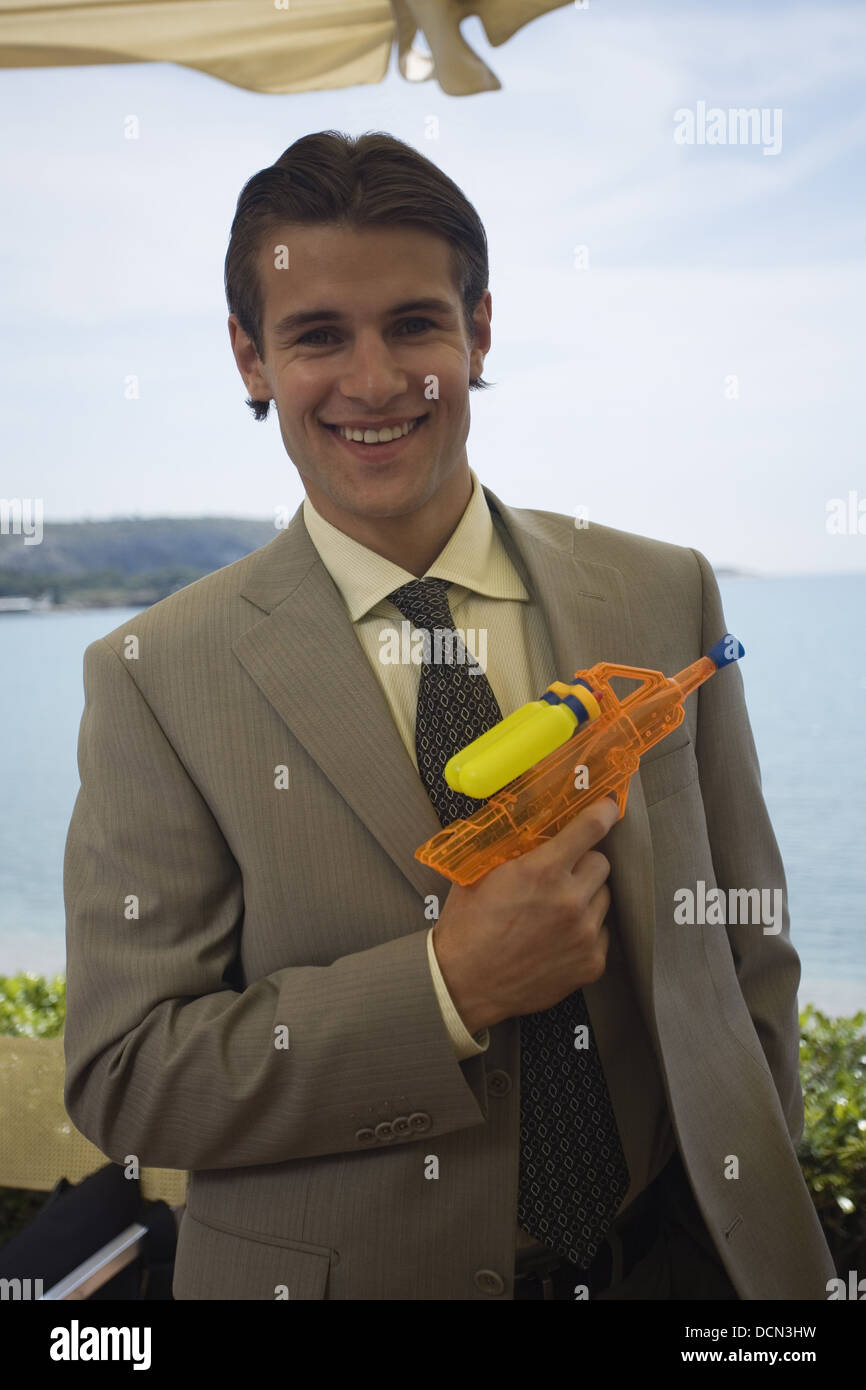 James bond toy gun hi-res stock photography and images - Alamy