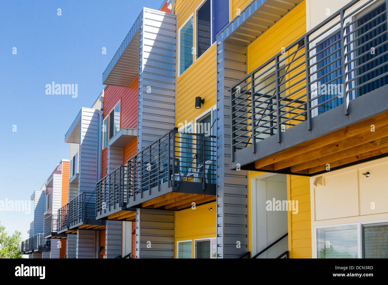 Modern arapartment complex painted in bright colors Stock Photo - Alamy