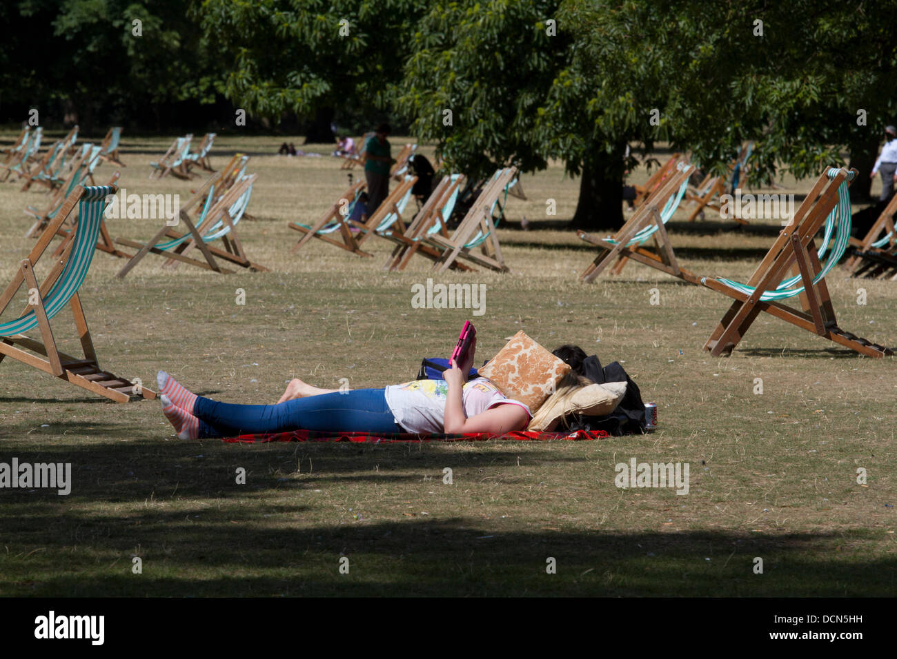 20th August 2013. Hyde Park London, UK. People sunbathing in Hyde Park ...