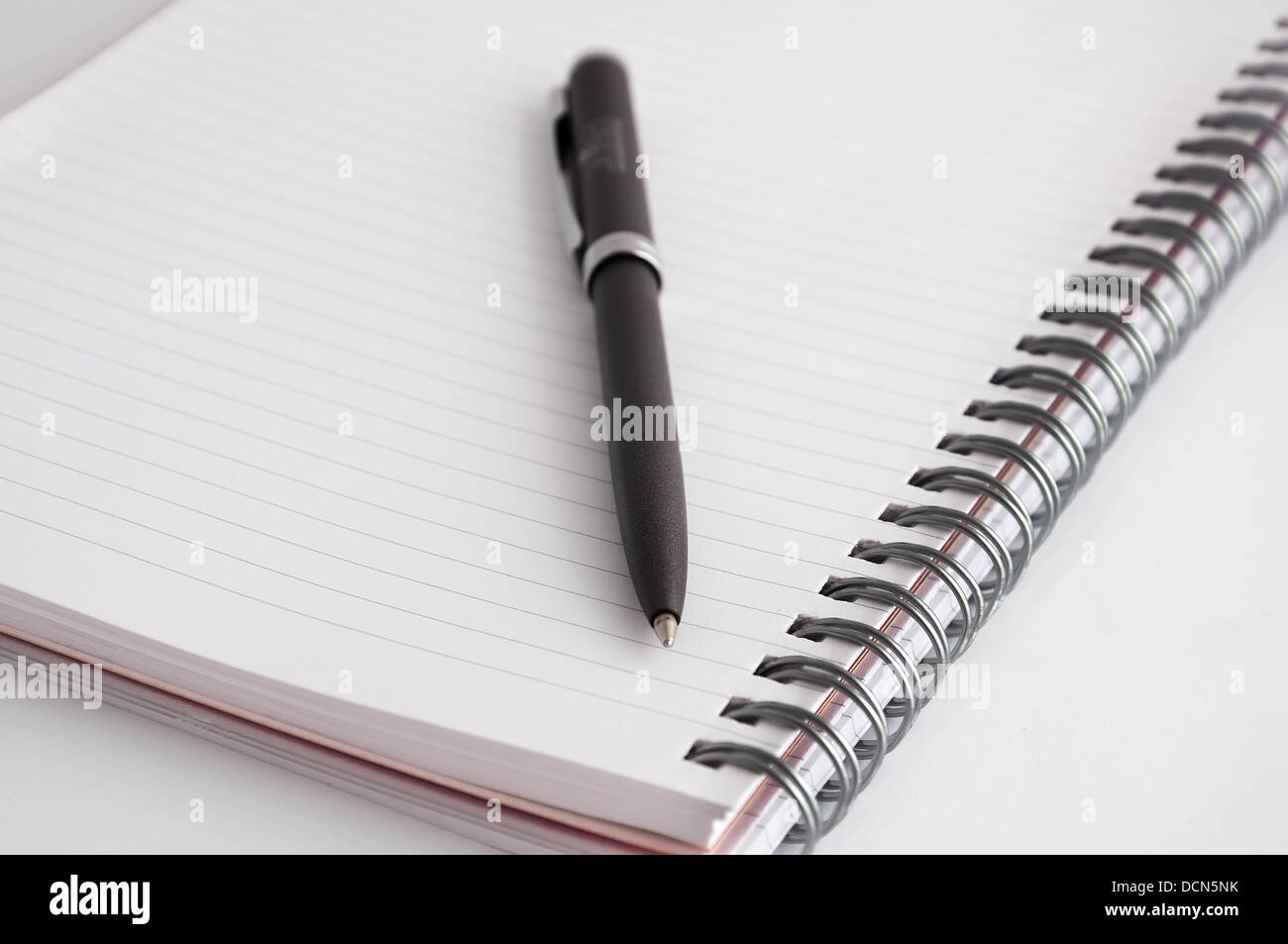 pen and notebook Stock Photo - Alamy