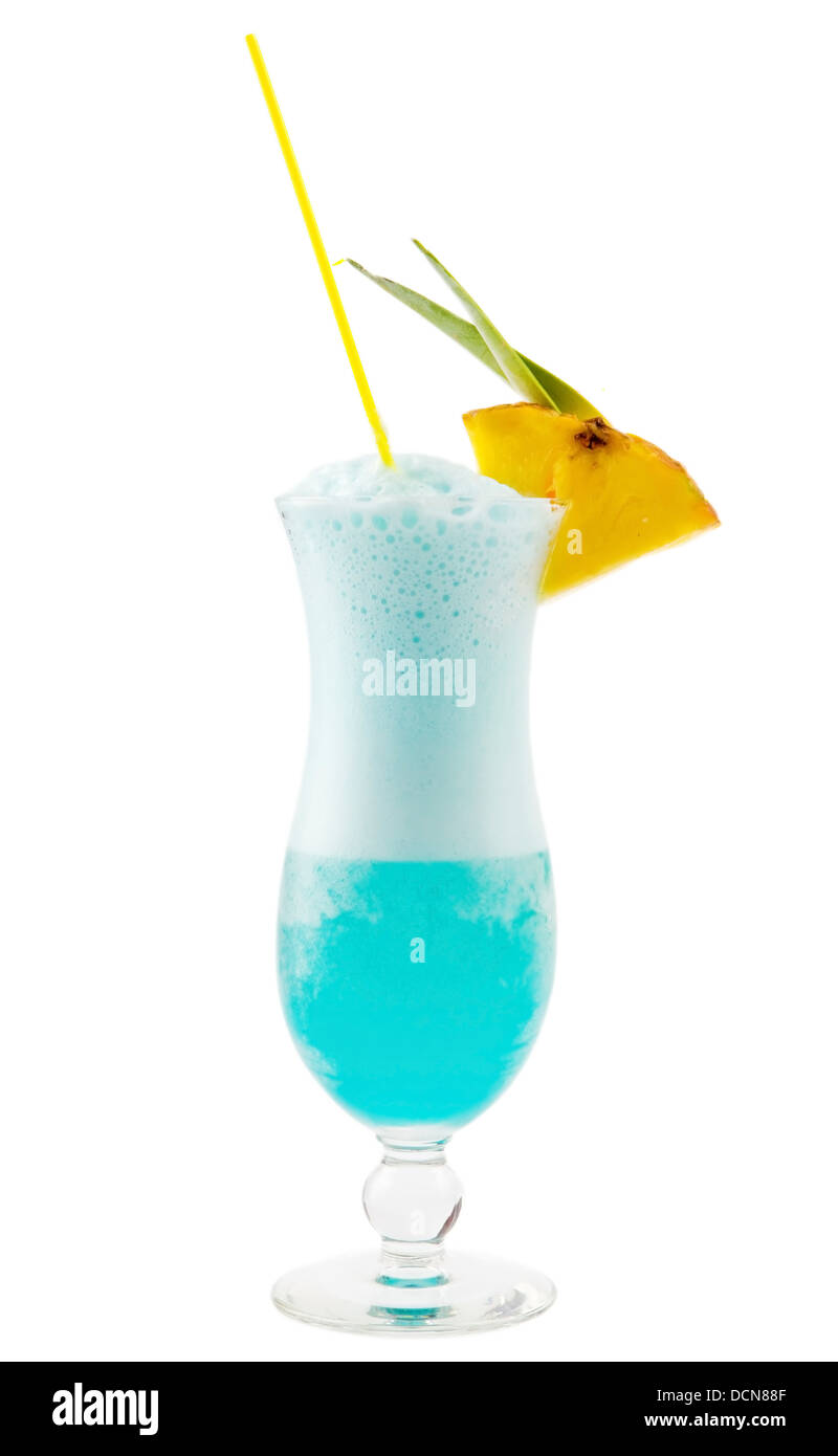 A delicious blue cocktail with slices of fresh pineapple and gre Stock ...